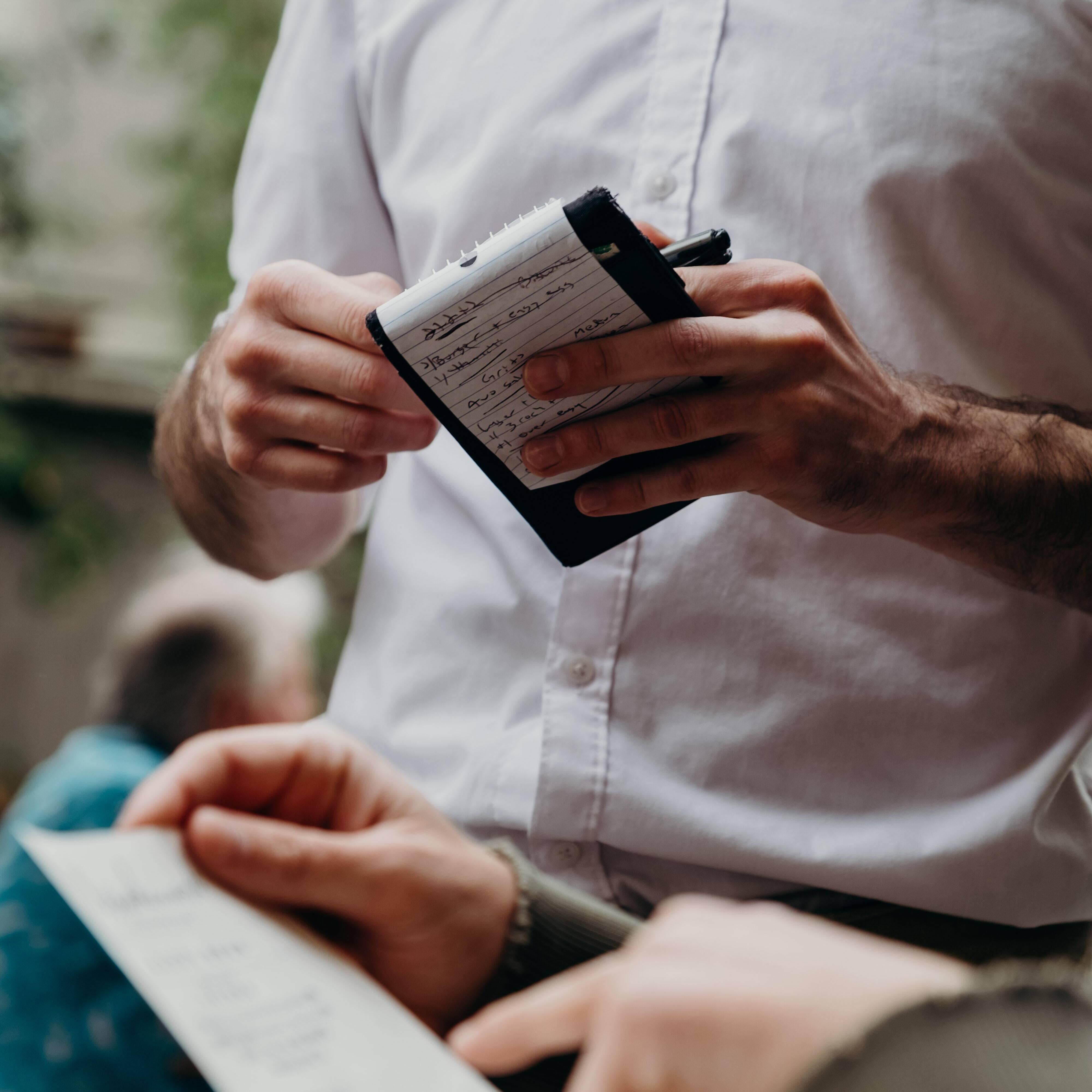 Restaurant Server Taking Order