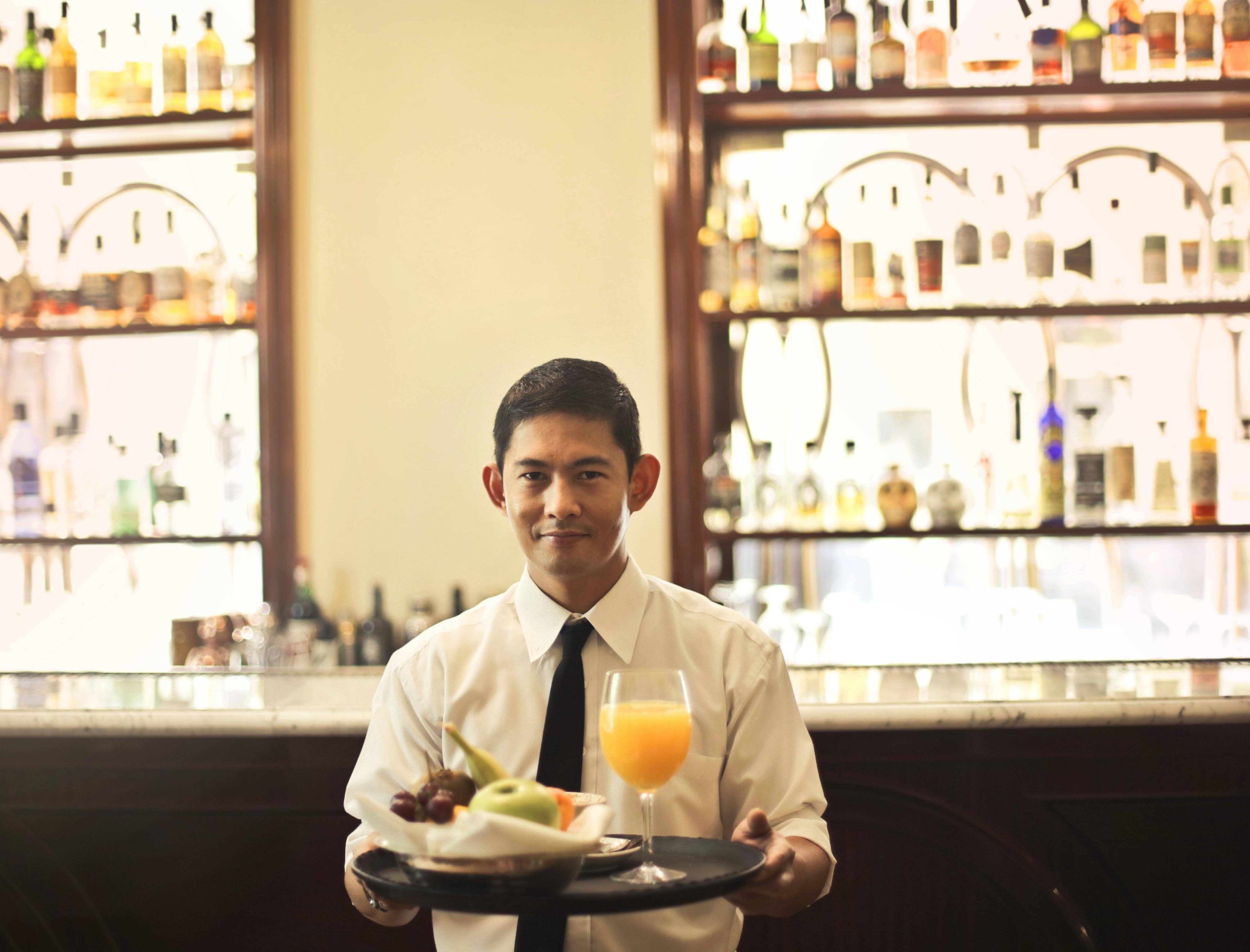 Waiter Serving Food
